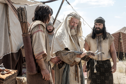 Nephi and his brothers showing Lehi the broken bow